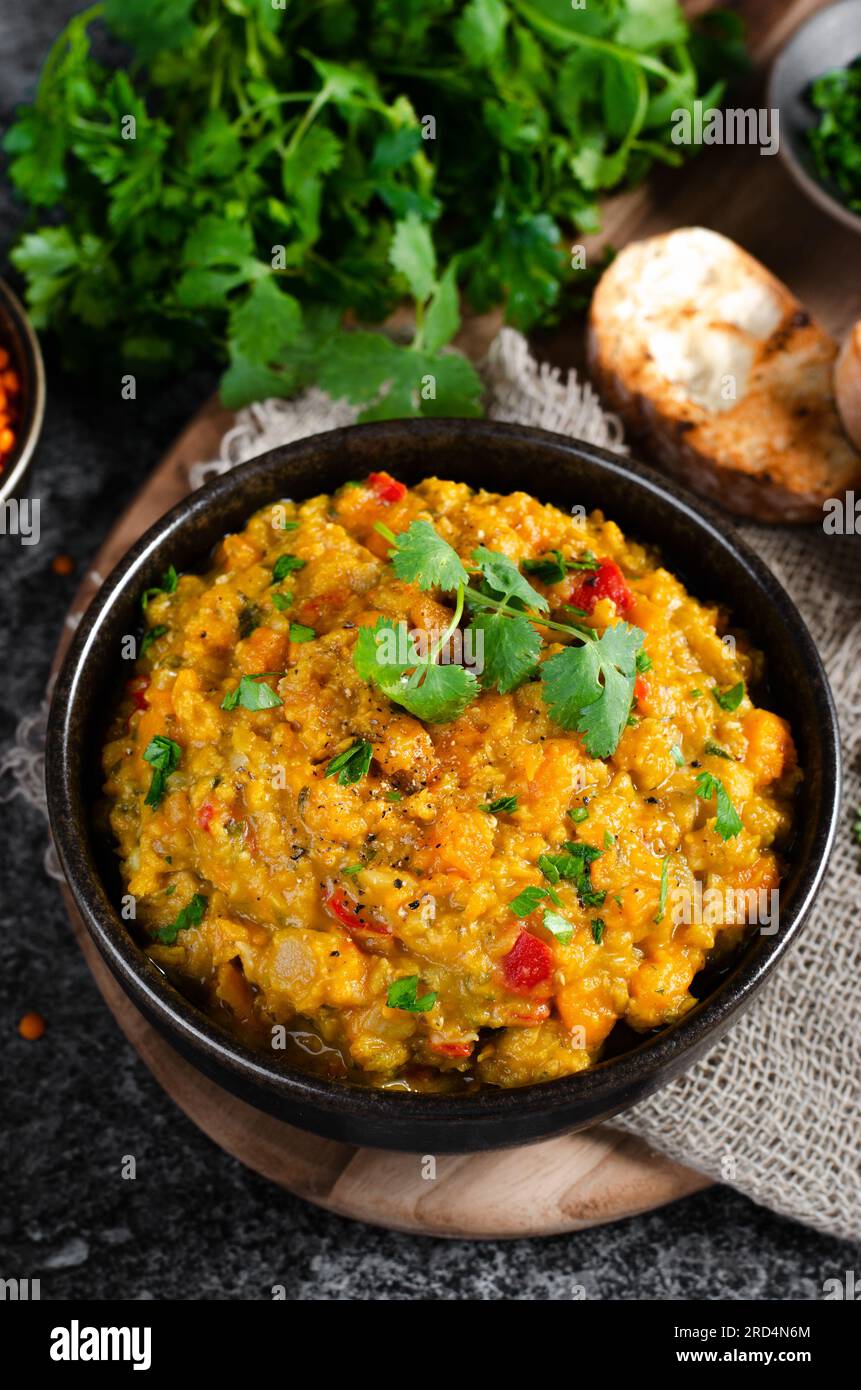 Red Lentils Indian Curry Dal, Lentil Dhal, Tasty Meal in a Bowl on Dark ...