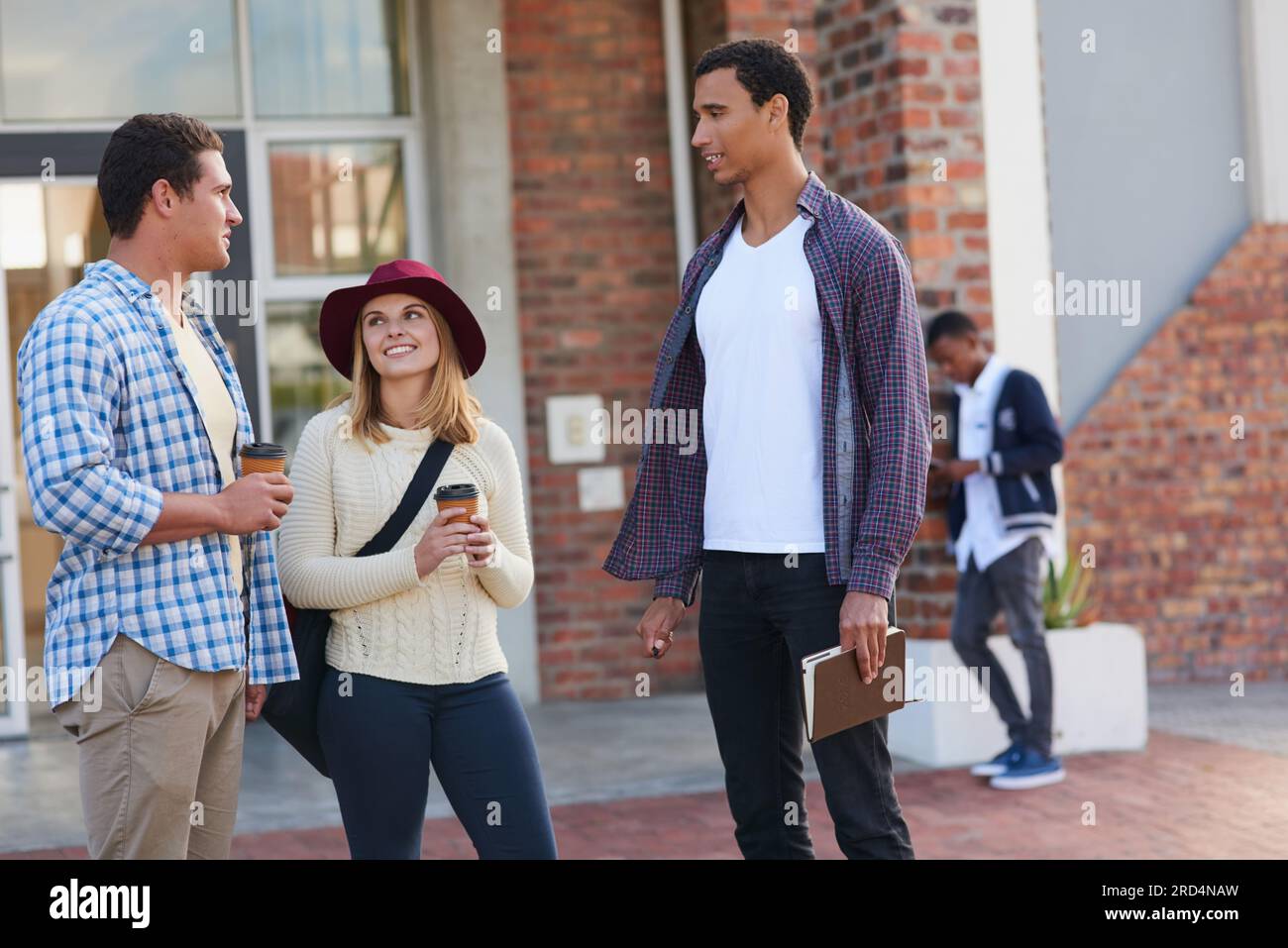 Catching up before class. Cropped shot of a group of university ...
