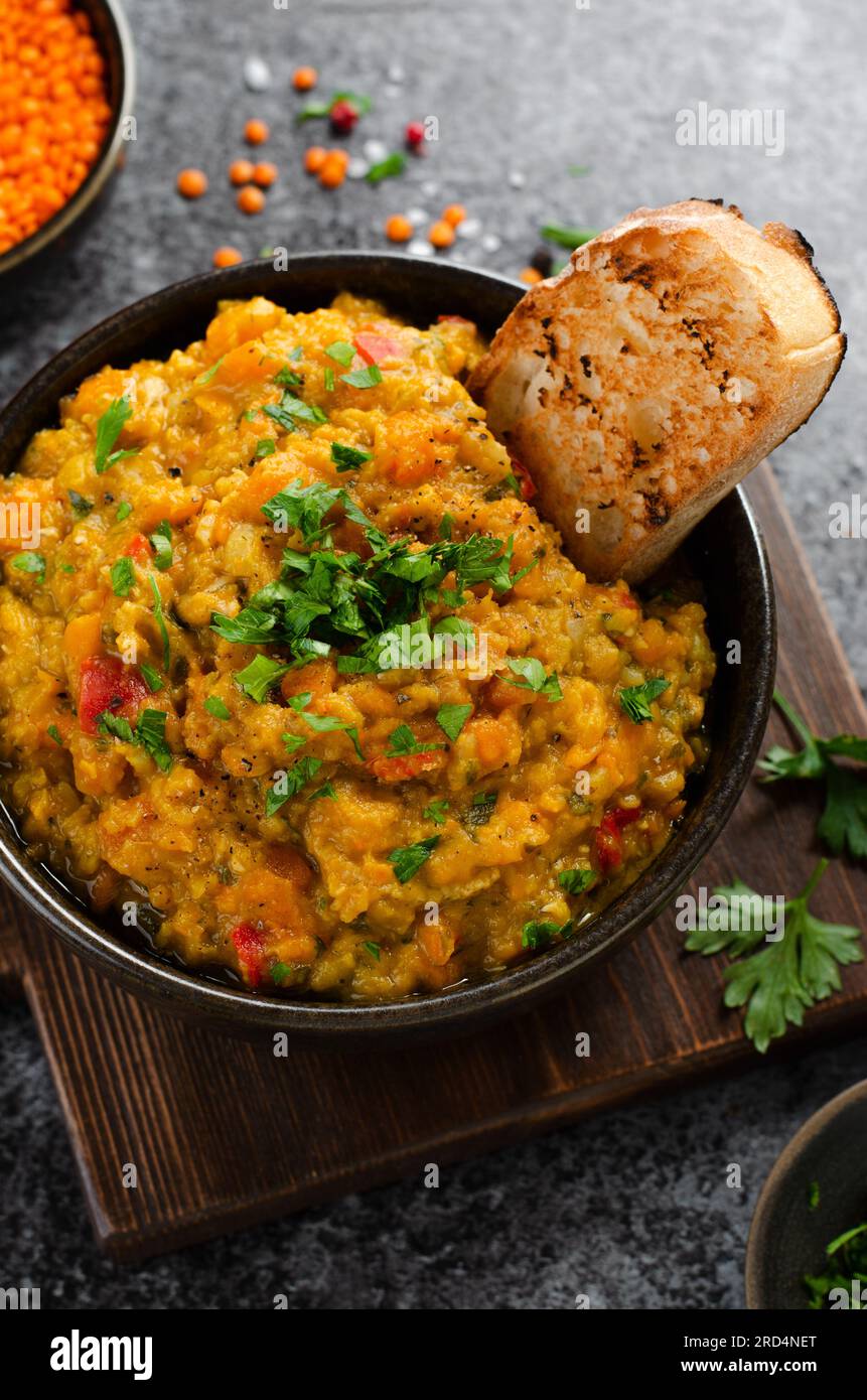 Red Lentils Indian Curry Dal, Lentil Dhal, Tasty Meal in a Bowl on Dark ...