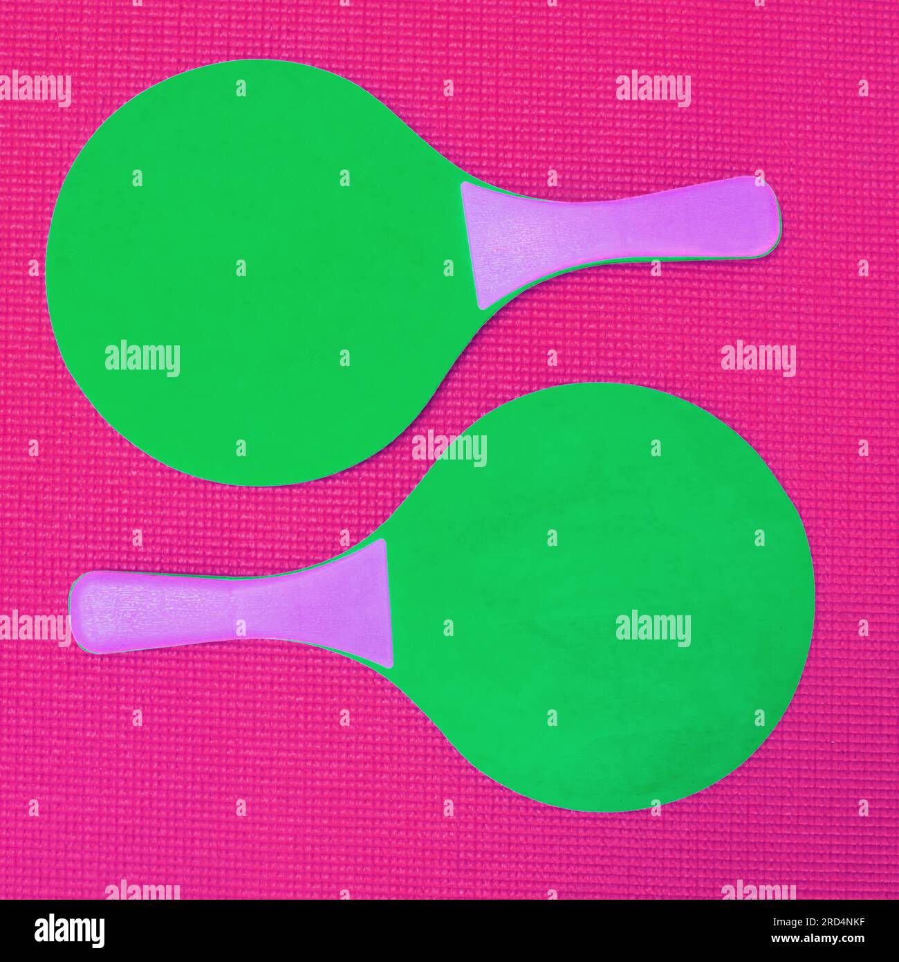 Simple yet a great game to play. High angle shot of two green table ...