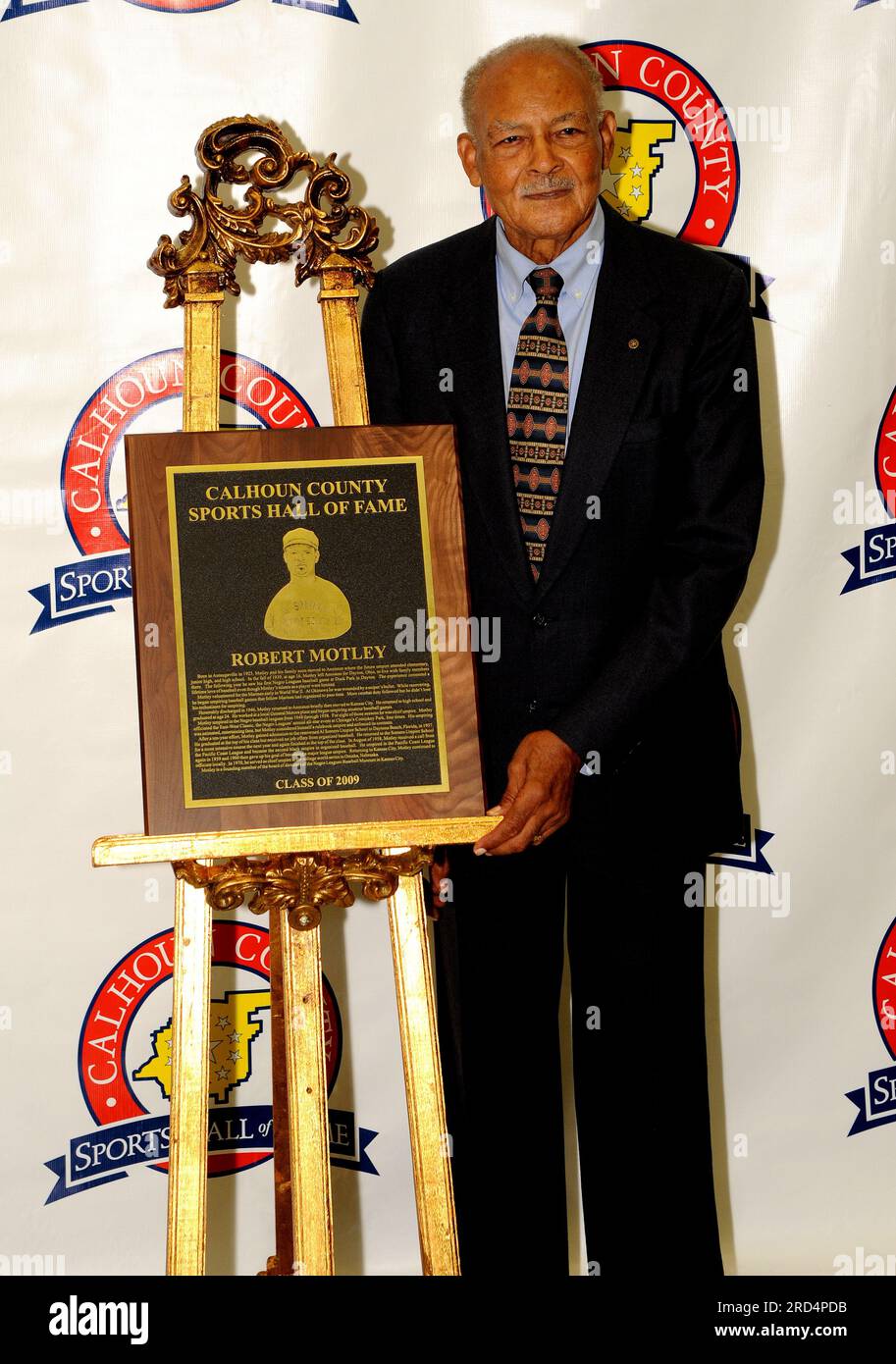 Bob Motley, former Negro League Baseball umpire, gets a plack from his ...