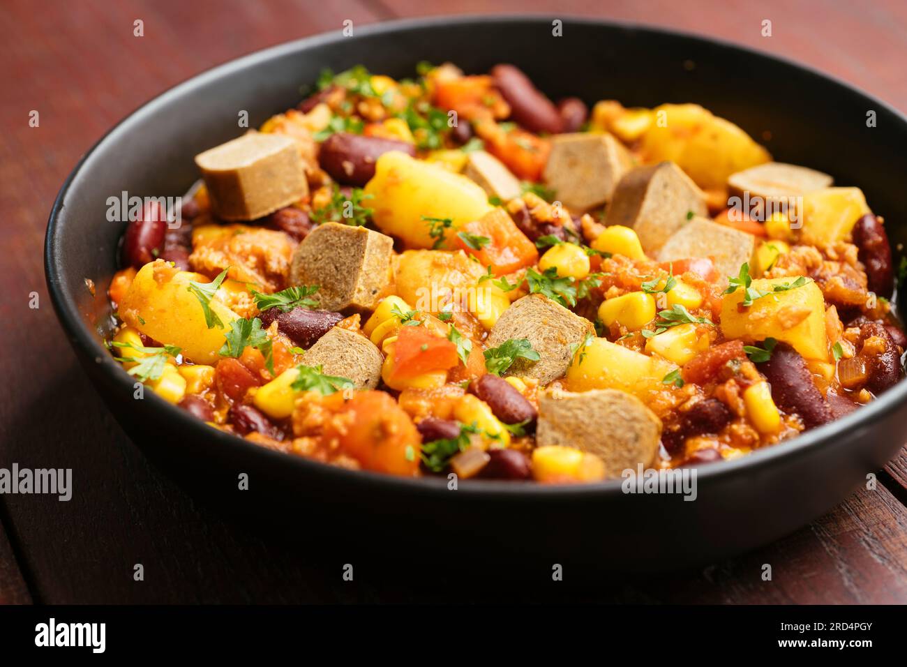 Vegan Cowboy Stew with onion, bell pepper, TVP granules, crushed ...