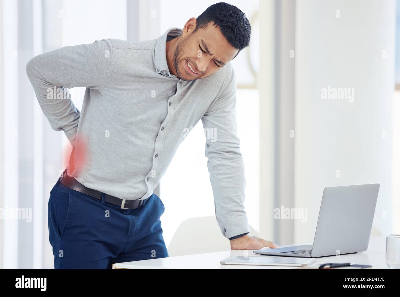 Businessman, laptop and back pain in burnout, stress or inflammation ...