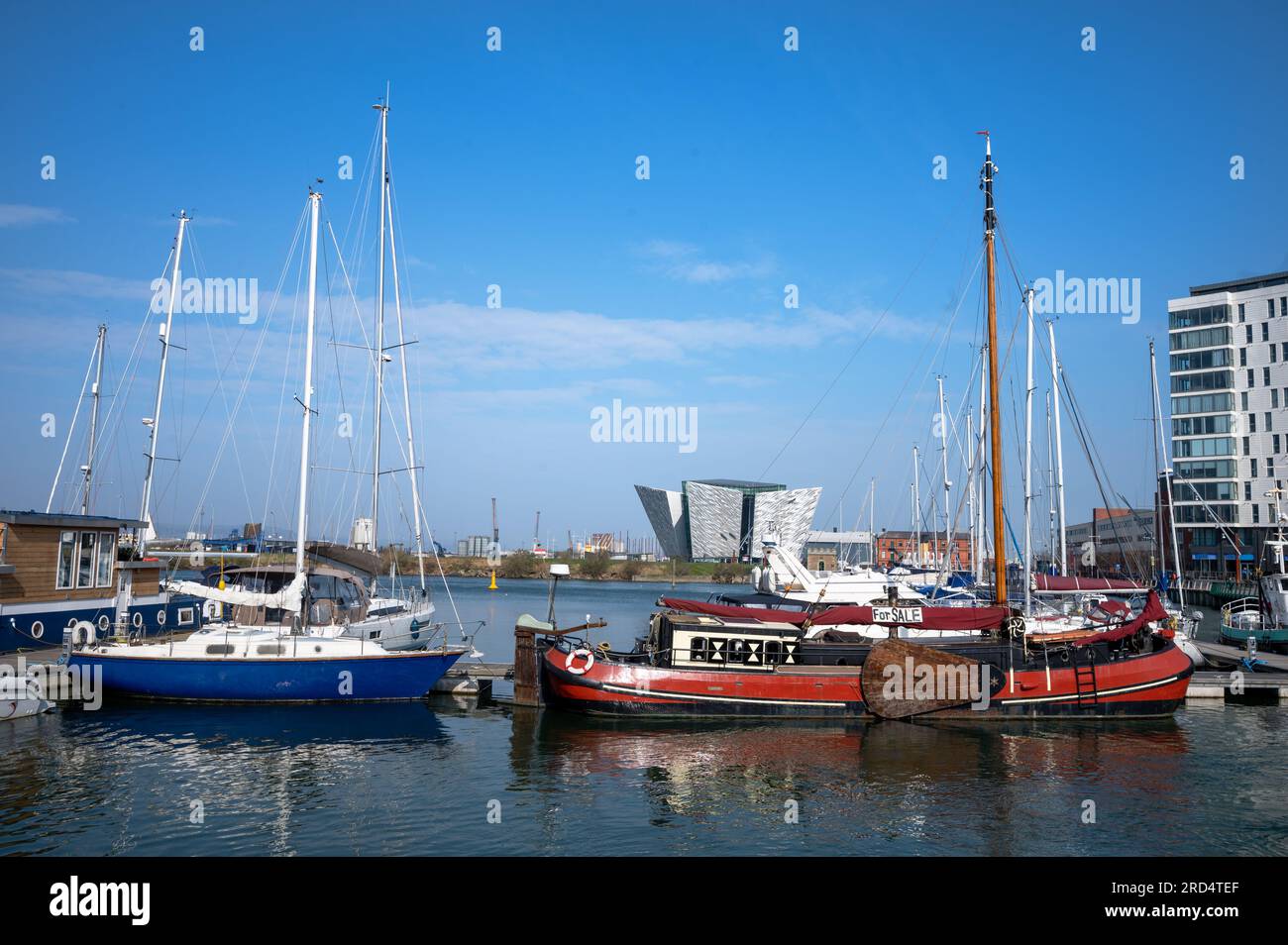 Yachts moored at Belfast harbor with Titanic Museum view in the ...