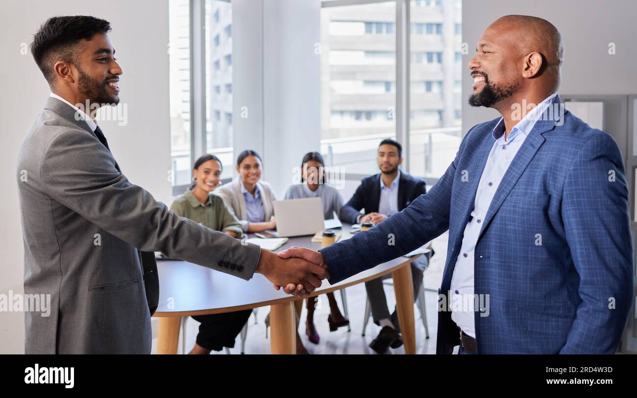Meeting, smile and hand shake with businessmen in office, b2b deal or ...