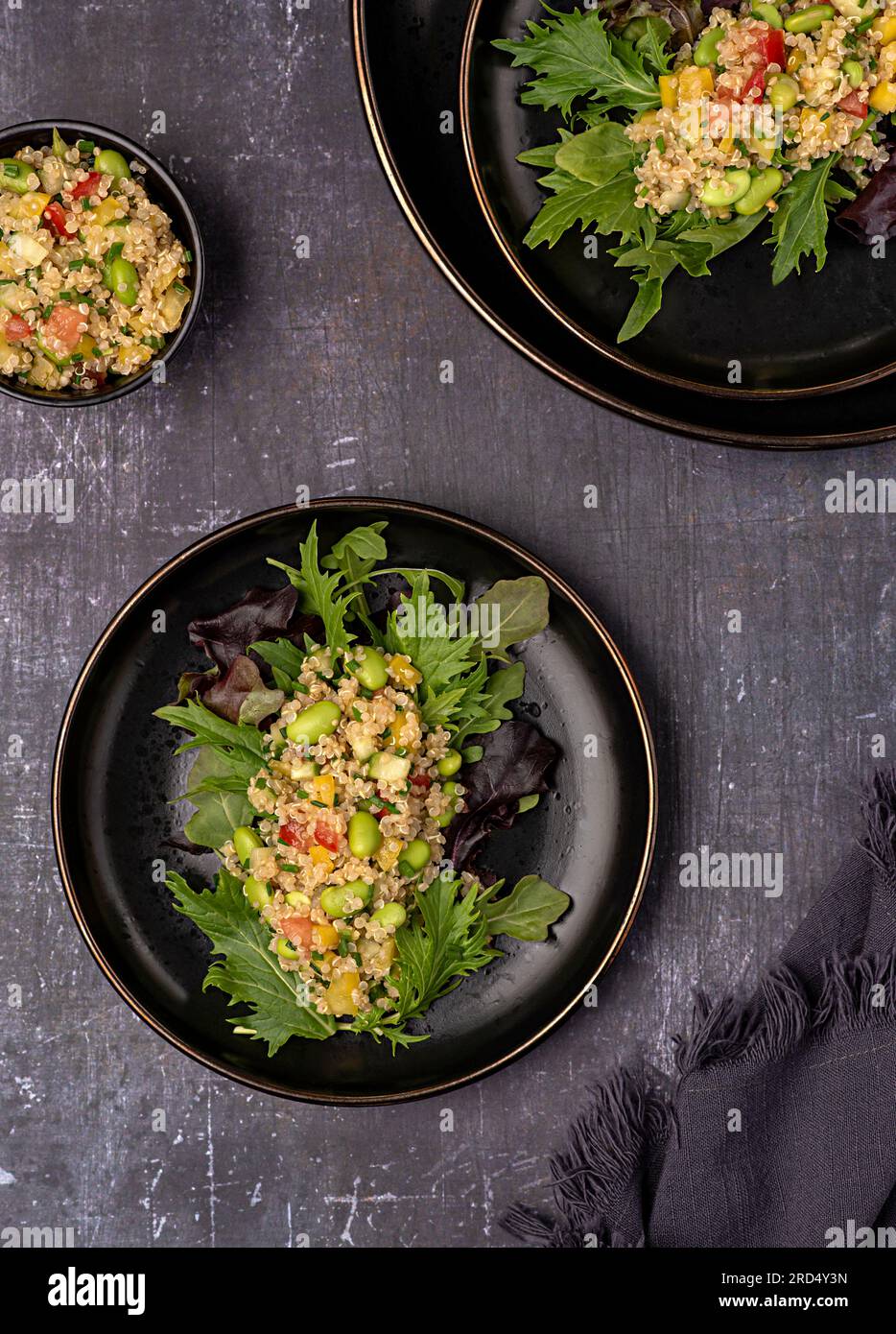 Food photography of salad, quinoa, cucumber, pepper, tomato, seasoning ...