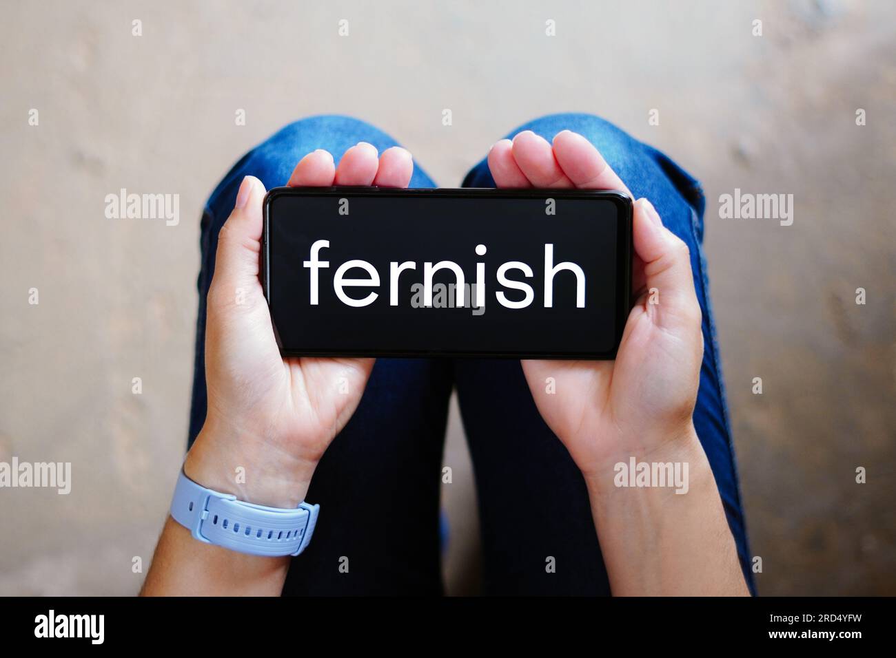 In this photo illustration, the Fernish logo seen displayed on a ...
