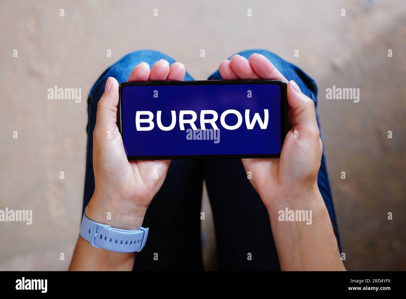 In this photo illustration, the Burrow logo seen displayed on a ...