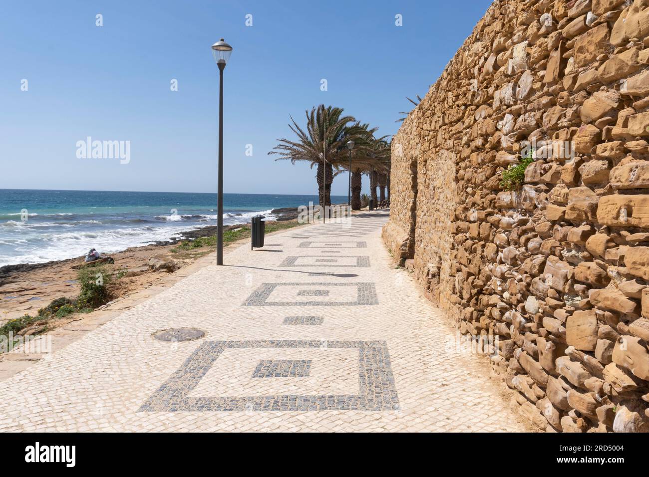 Historic Roman masonry on the beach promenade in Praia da Luz, Faro ...