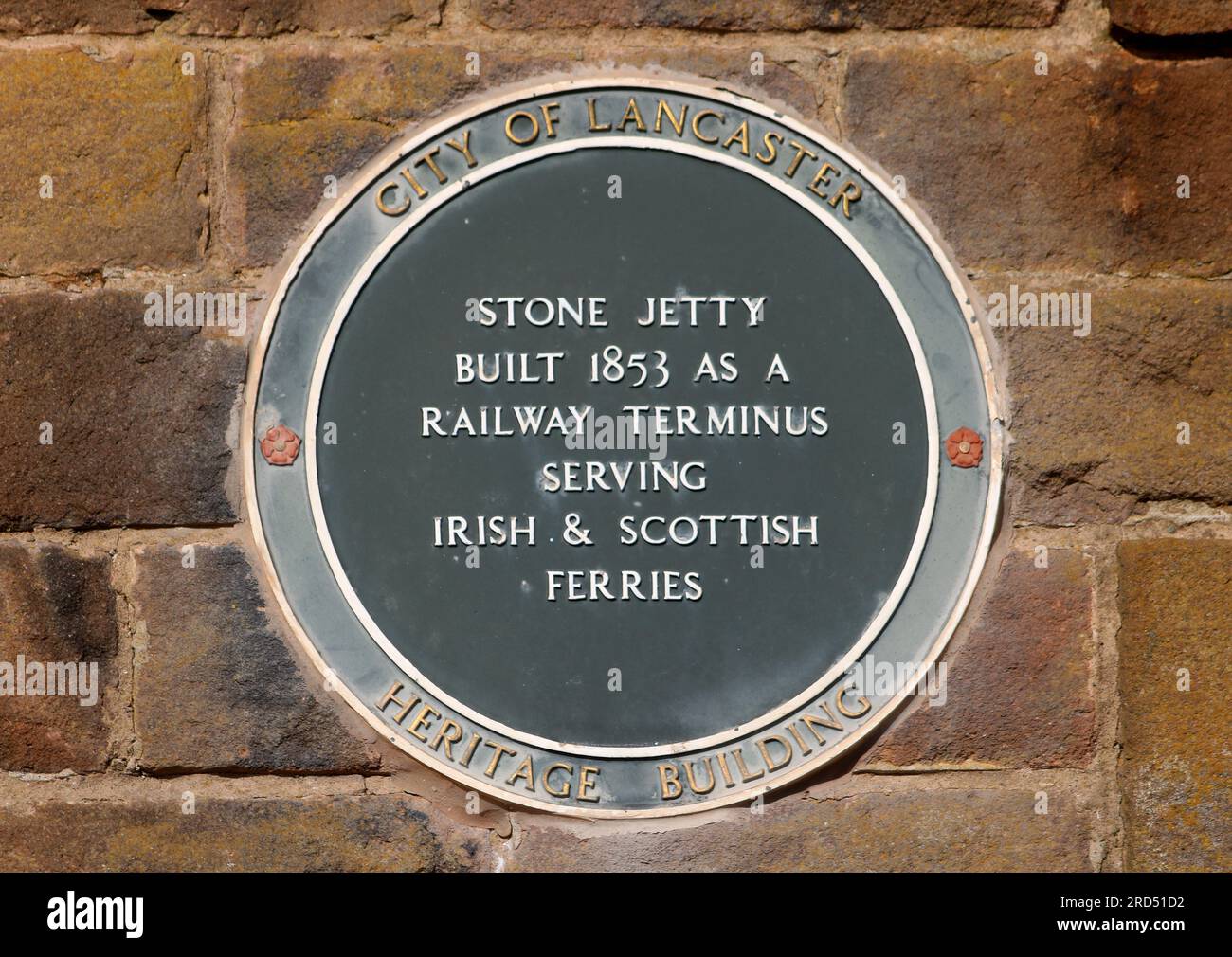 Plaque on wall of building on Stone Jetty, Morecambe marking the site ...