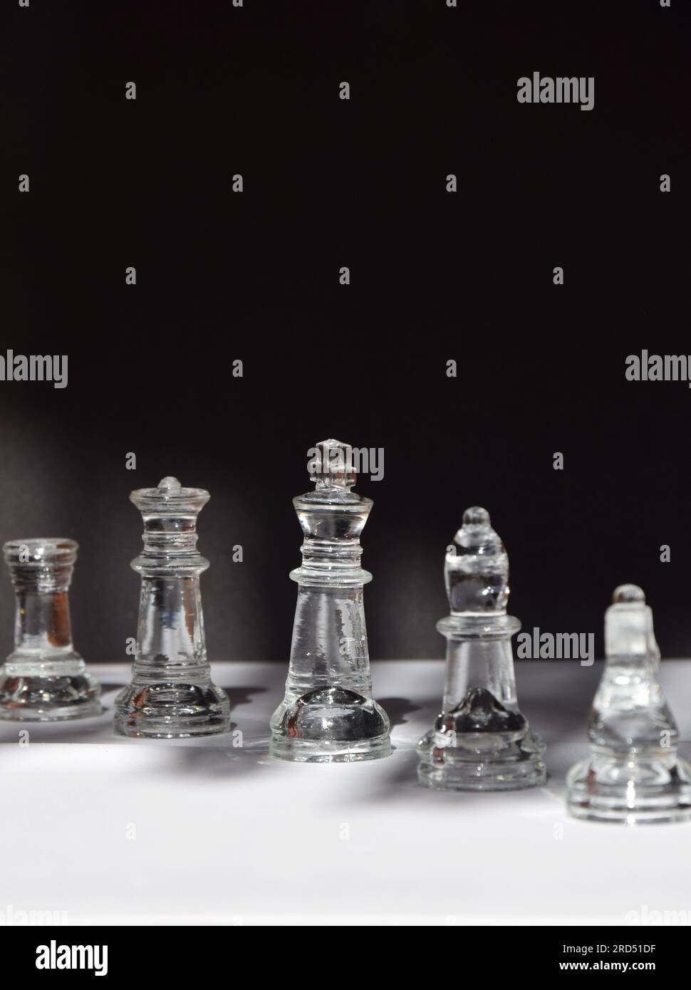 Glass Chess Pieces in Formation Stock Photo - Alamy