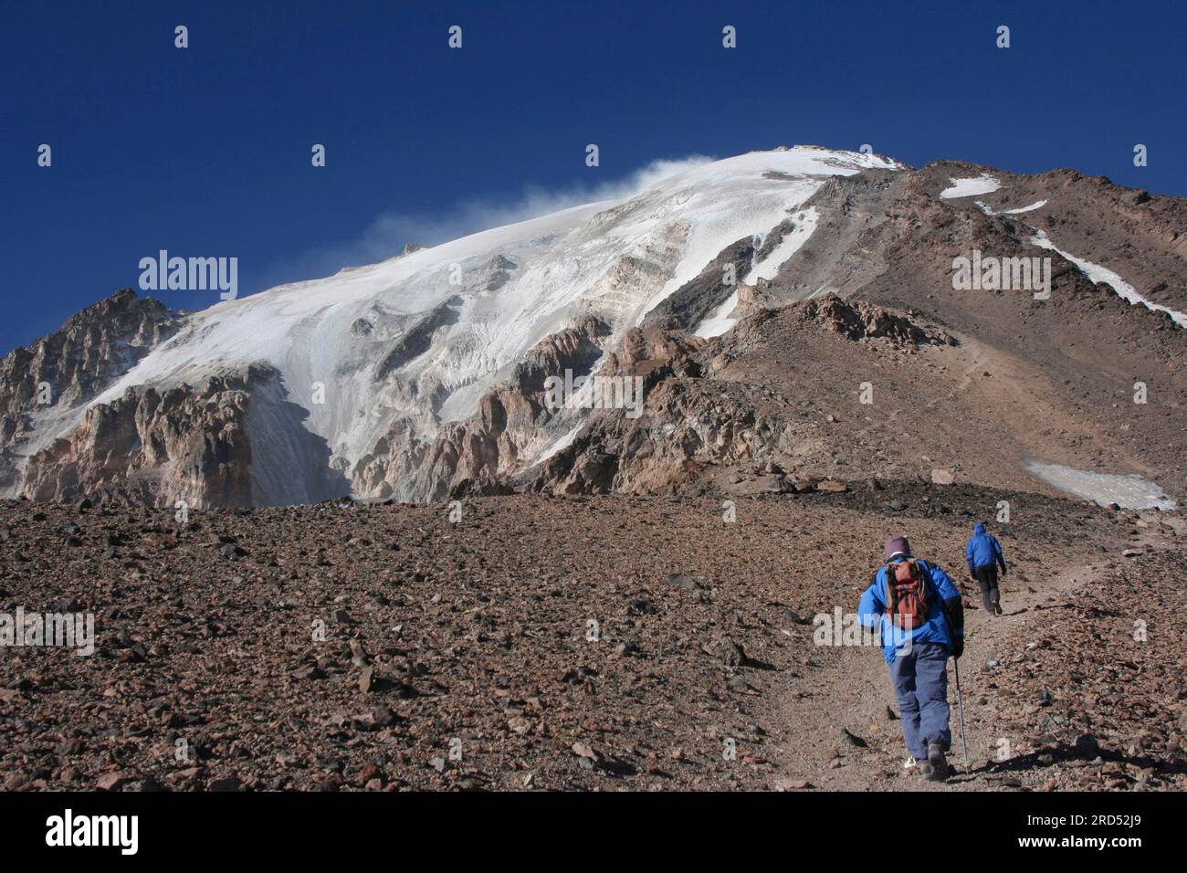 Two climbers on the eastern flank of Damavand volcano, Iran Stock Photo ...