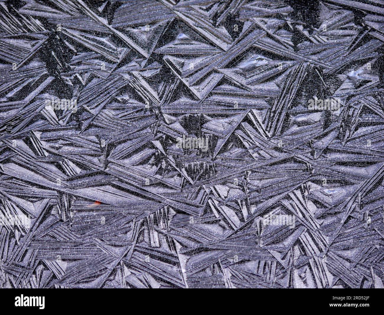 Ice crystals in the garden pond, ice patterns, ice formations, ice ...