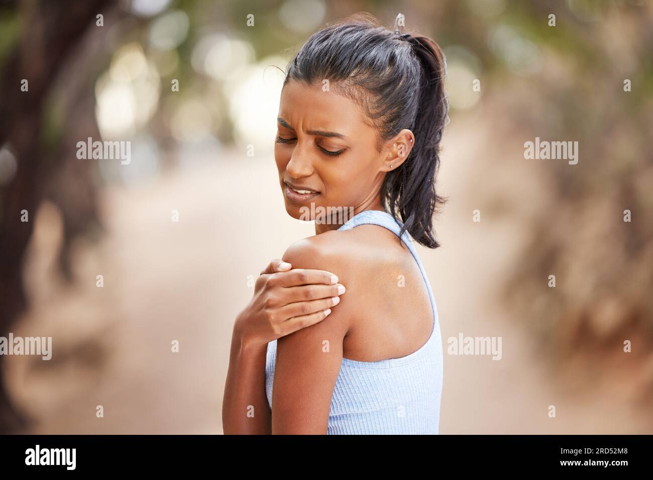 Fitness, running and woman with shoulder pain after outdoor training ...