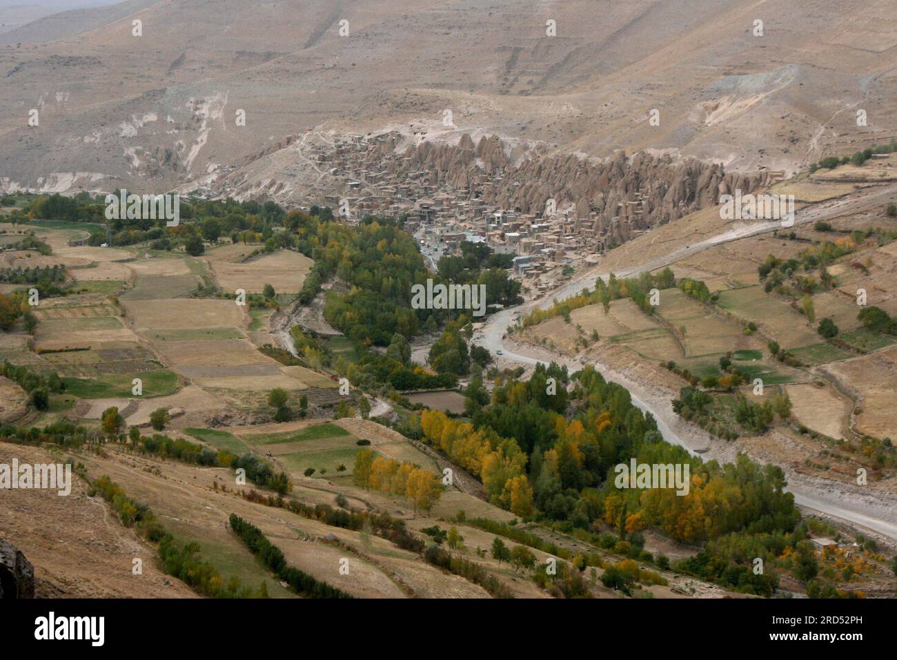 The mountain village of Kandovan with its rock dwellings at the foot of ...