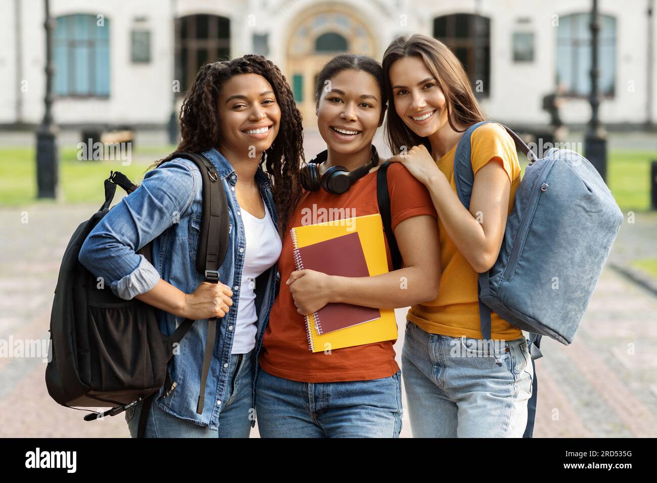 College Friendship Concept. Three Multiethnic Female Students Posing ...
