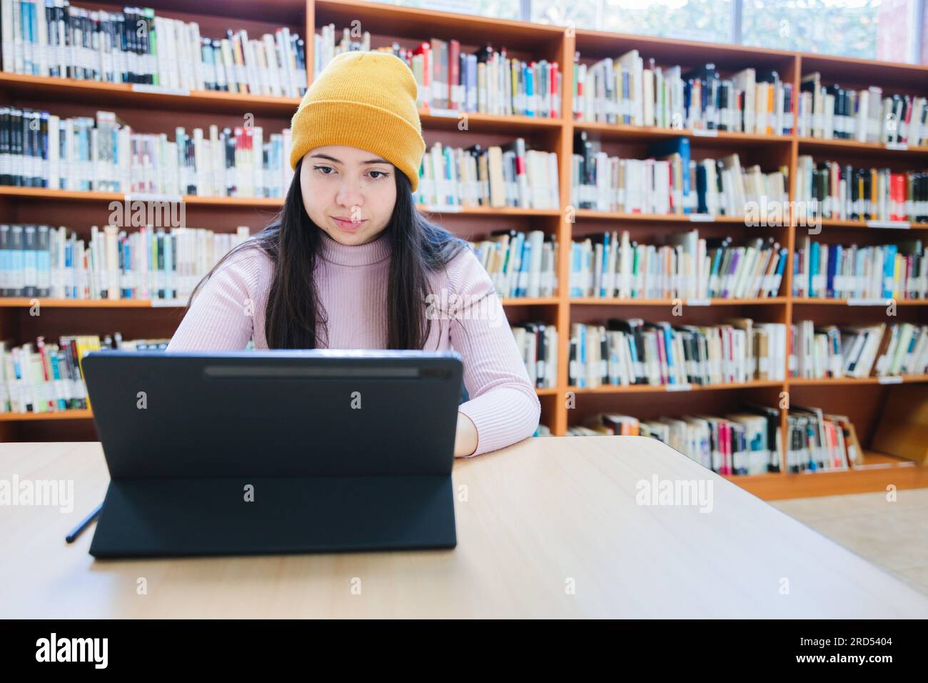 College space: Front view of Young Female University Student Studying ...