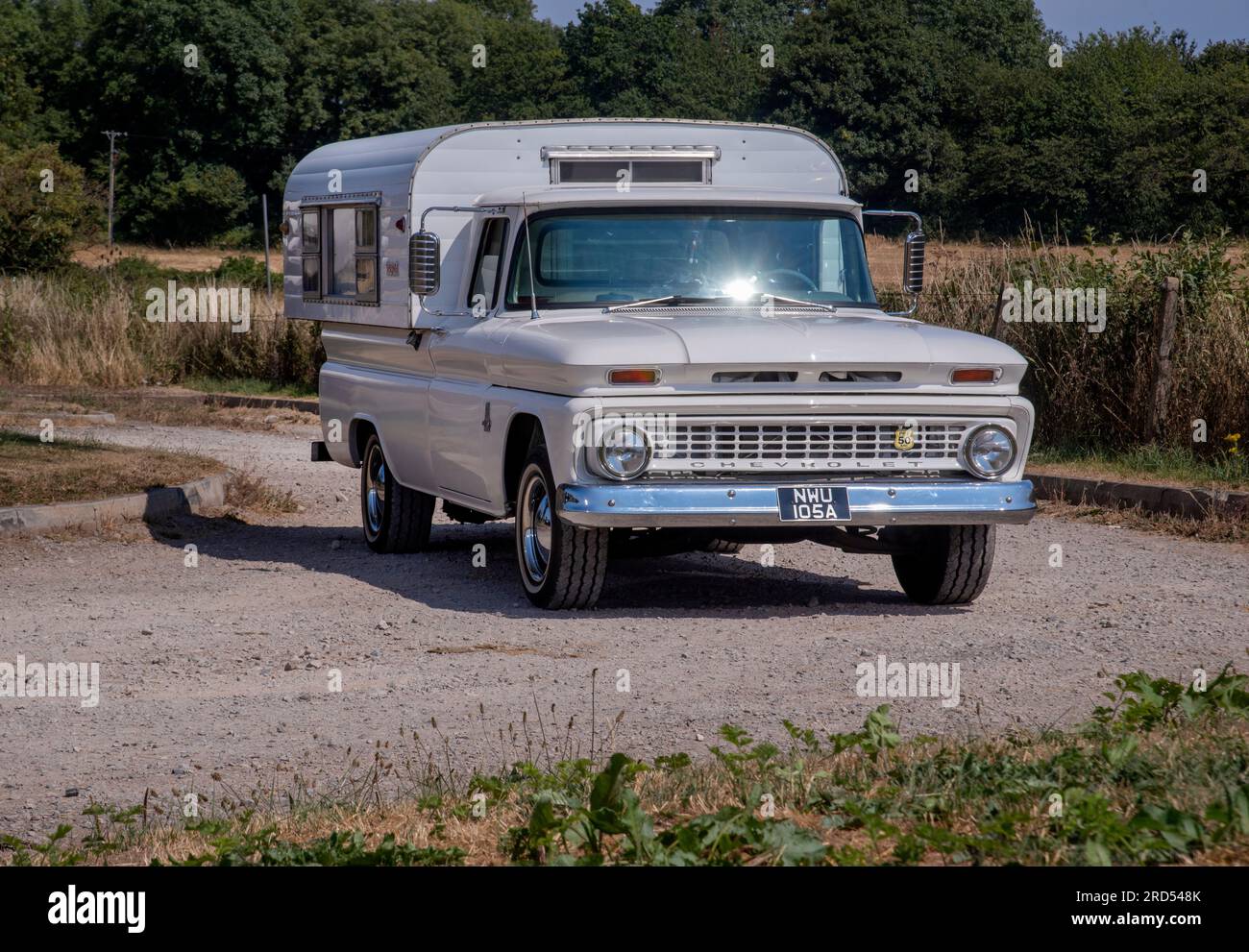1965 'Alaskan' pop up camper fitted to a 1958 Chevy truck Stock Photo ...
