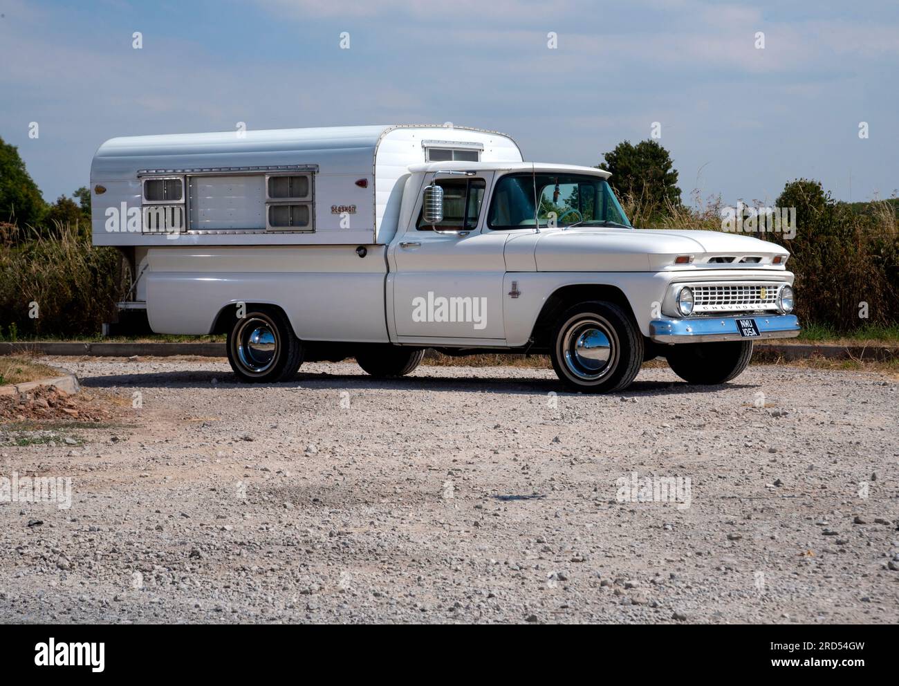 1965 'Alaskan' pop up camper fitted to a 1958 Chevy truck Stock Photo ...