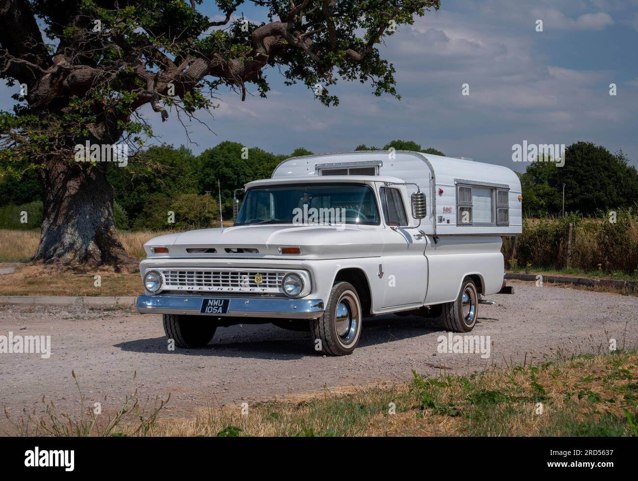 1965 'Alaskan' pop up camper fitted to a 1958 Chevy truck Stock Photo ...