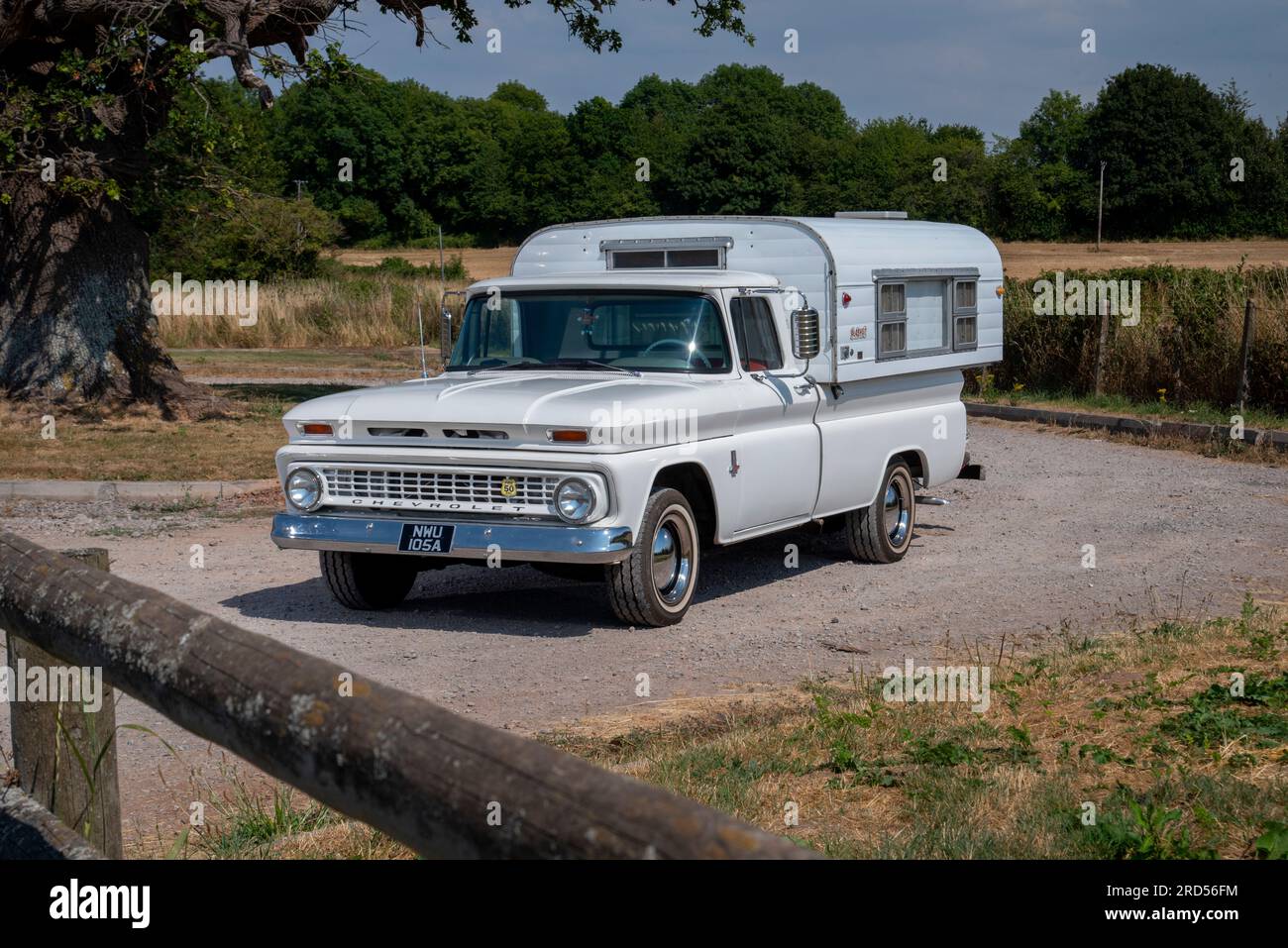 1965 'Alaskan' pop up camper fitted to a 1958 Chevy truck Stock Photo ...