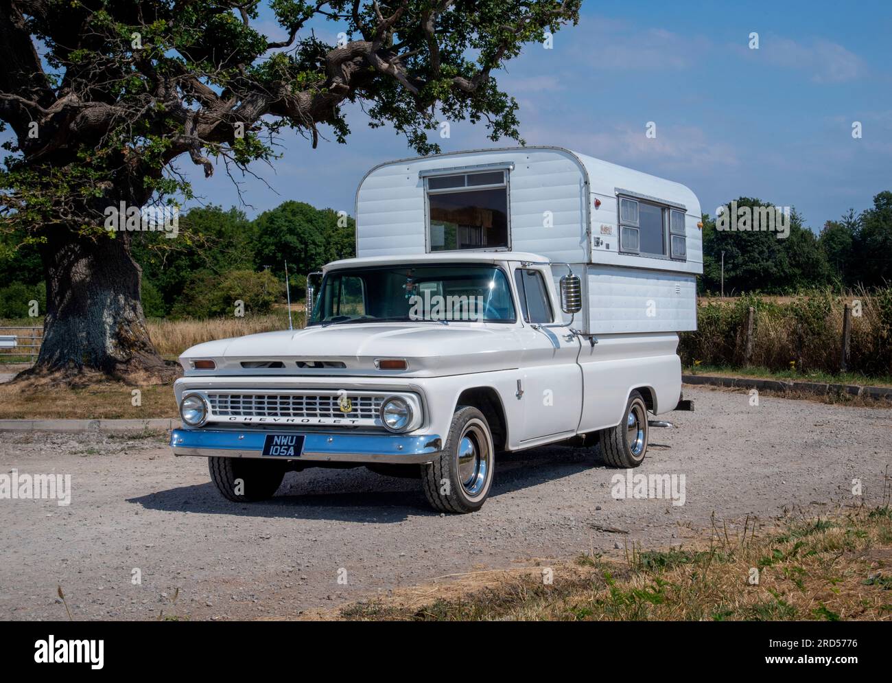 1965 'Alaskan' pop up camper fitted to a 1958 Chevy truck Stock Photo ...
