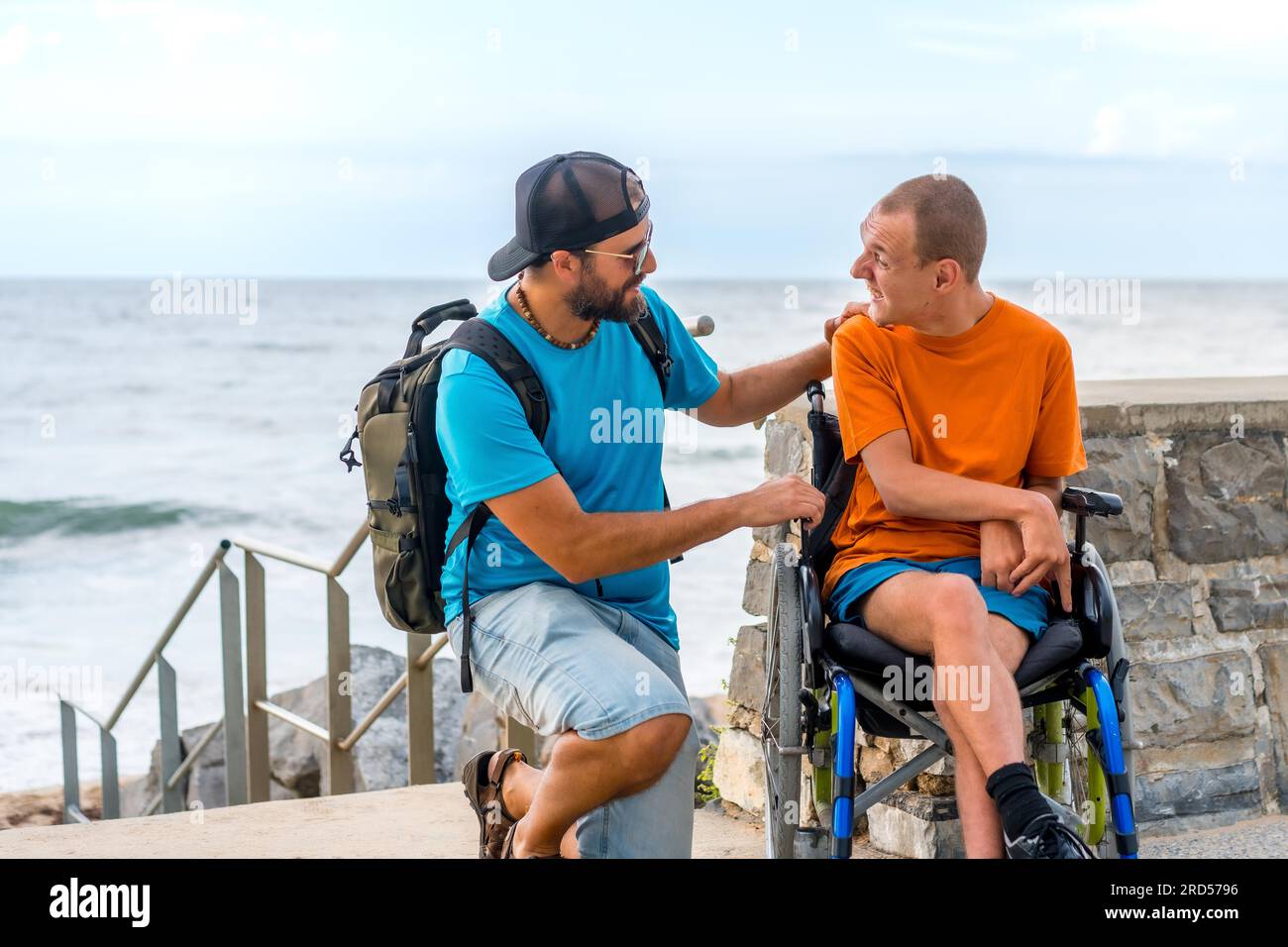 A disabled person in a wheelchair with a friends on summer vacation ...