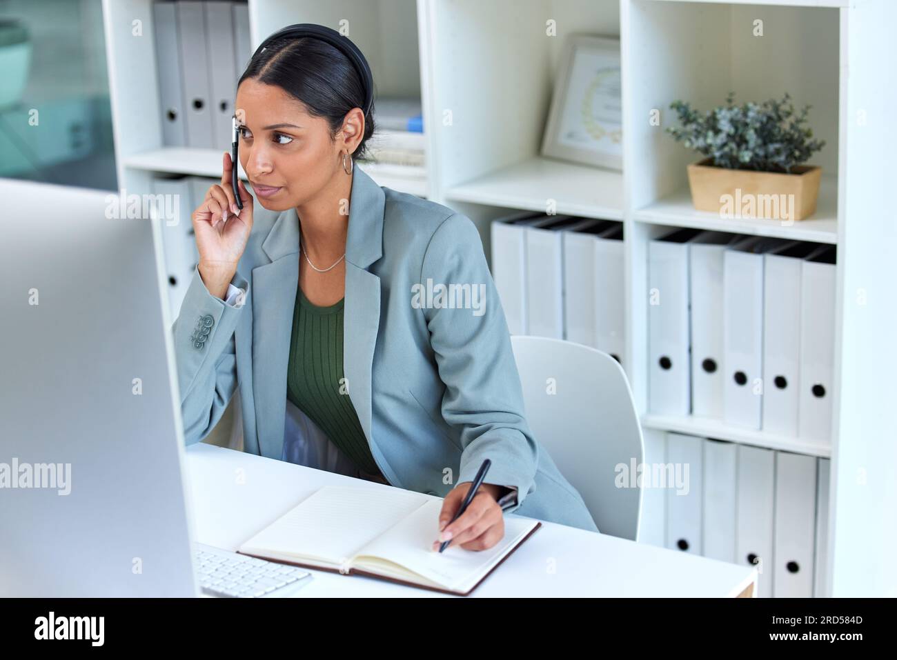 Business woman, call center and web support communication writing in a ...