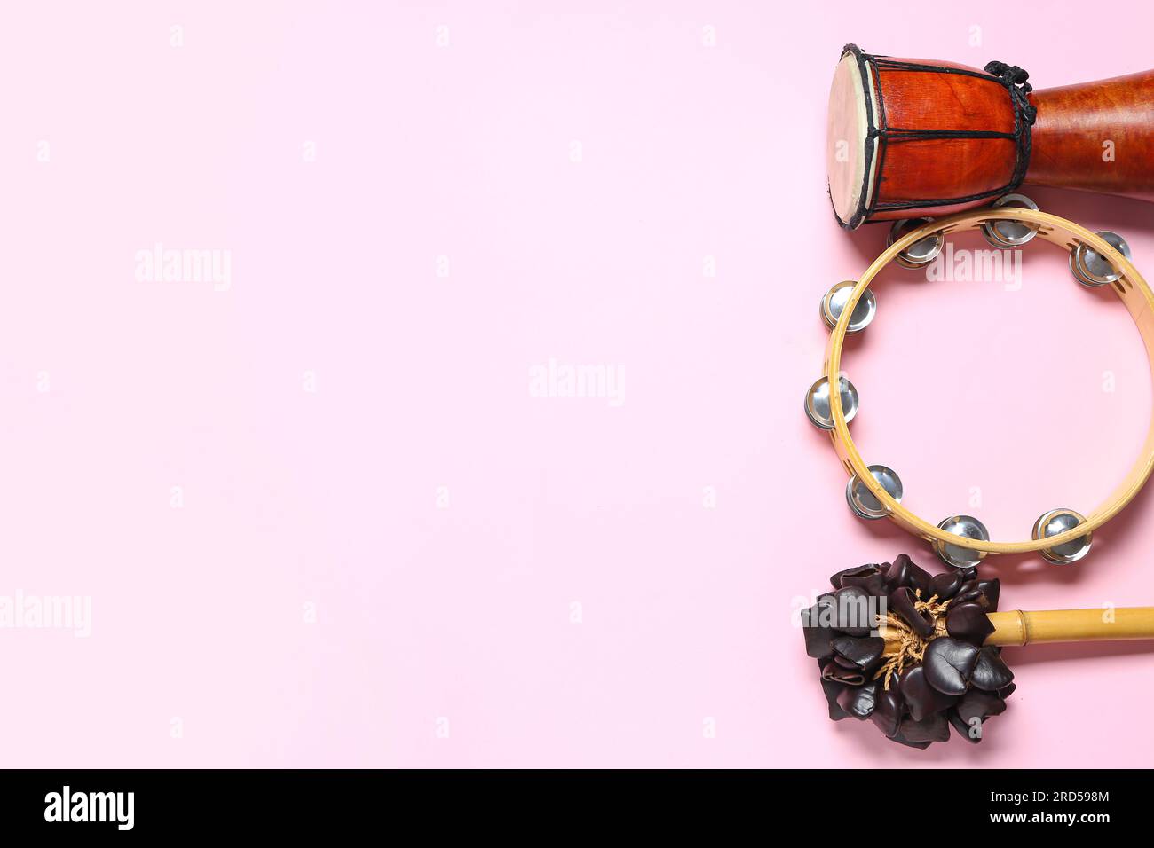 Different musical instruments on color background Stock Photo - Alamy