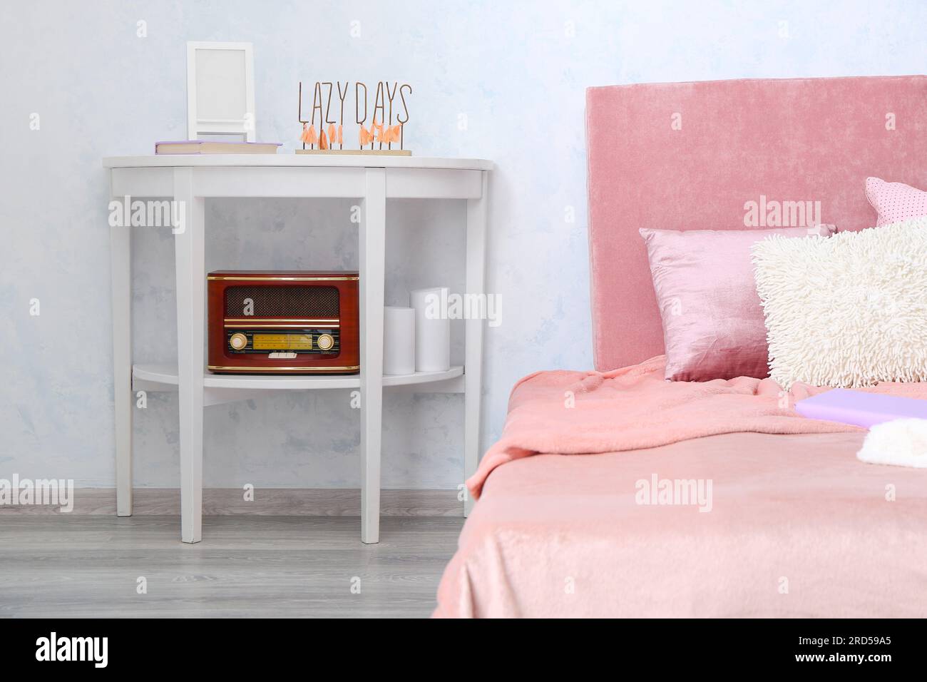 Interior of modern bedroom with retro radio receiver Stock Photo - Alamy