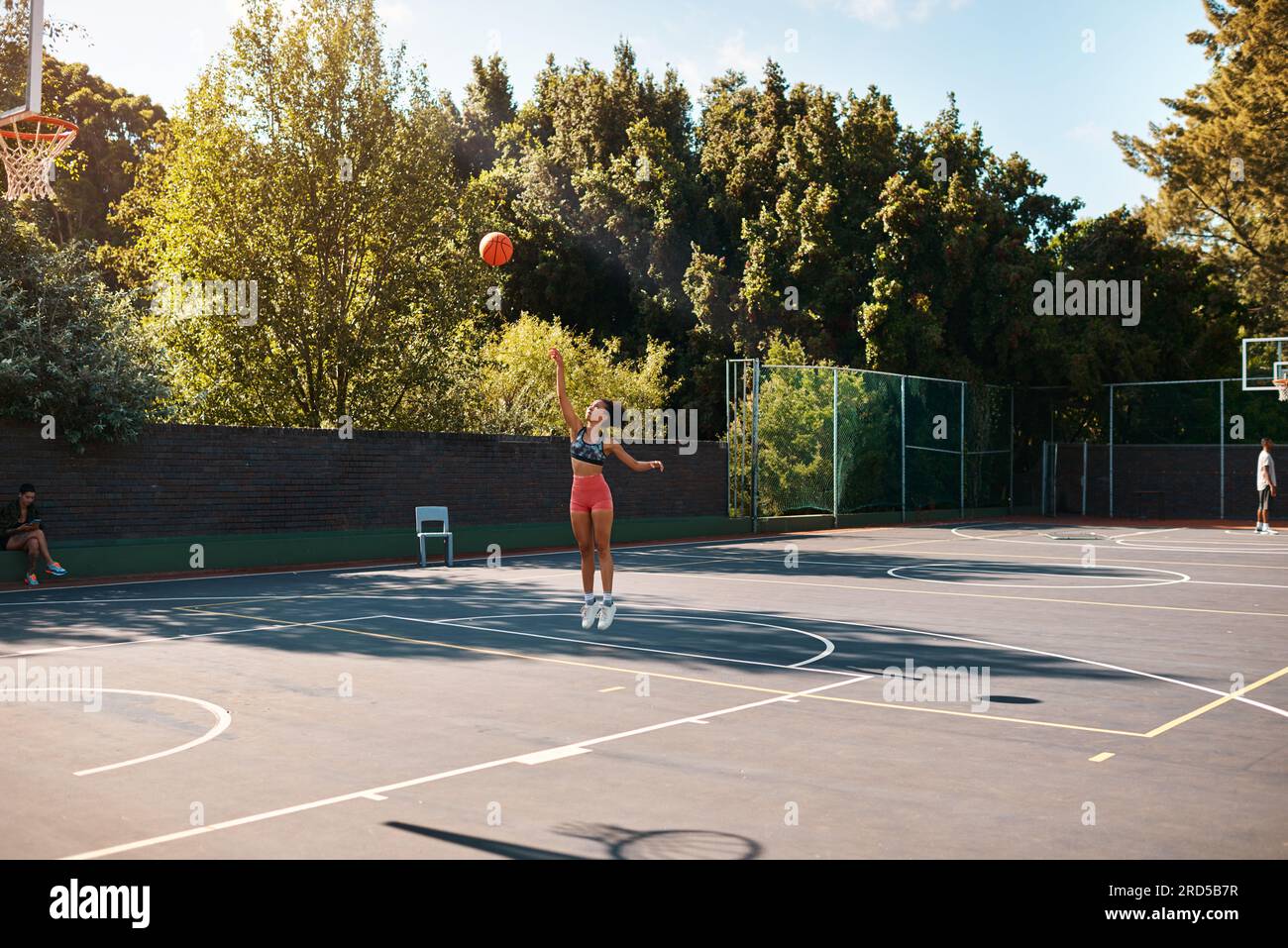 Woman basketball court jump hi-res stock photography and images - Alamy