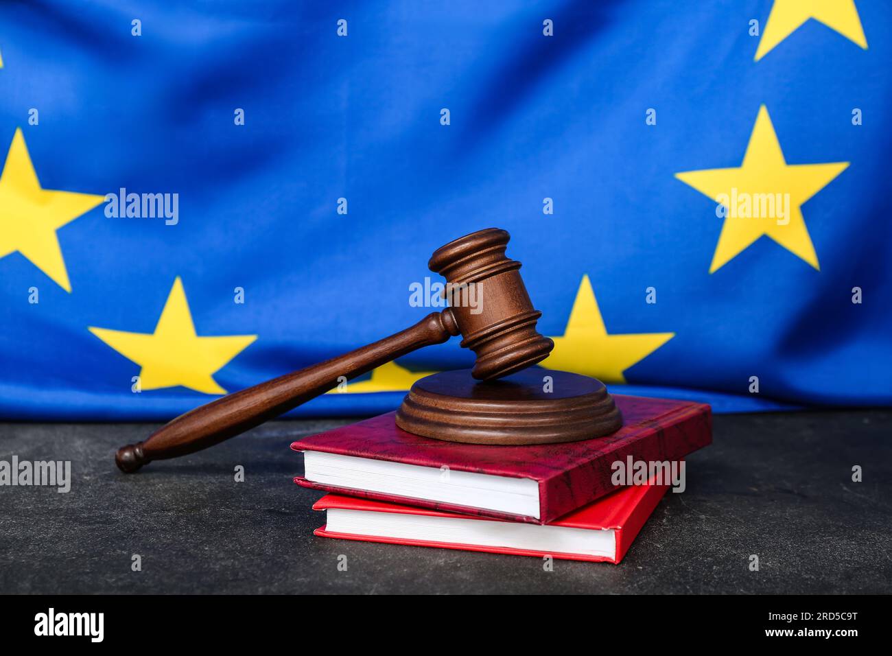 Judges gavel, flag of European Union and books on black table Stock ...