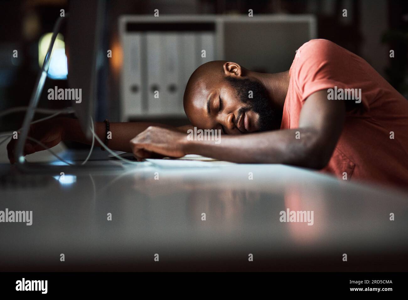 Hes had enough. Cropped shot of a man falling asleep while working late ...