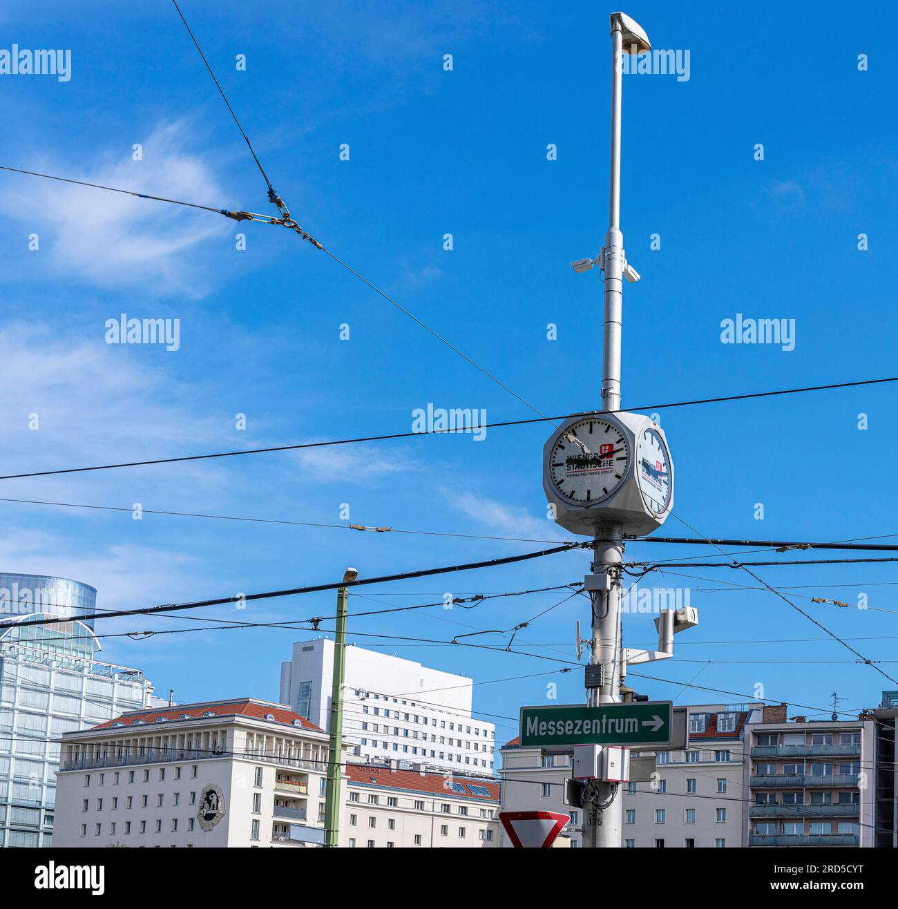 Traffic mast with clock on public road, Vienna, Austria Stock Photo - Alamy
