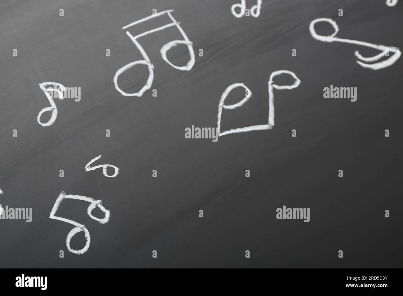 Different music notes on black background Stock Photo - Alamy
