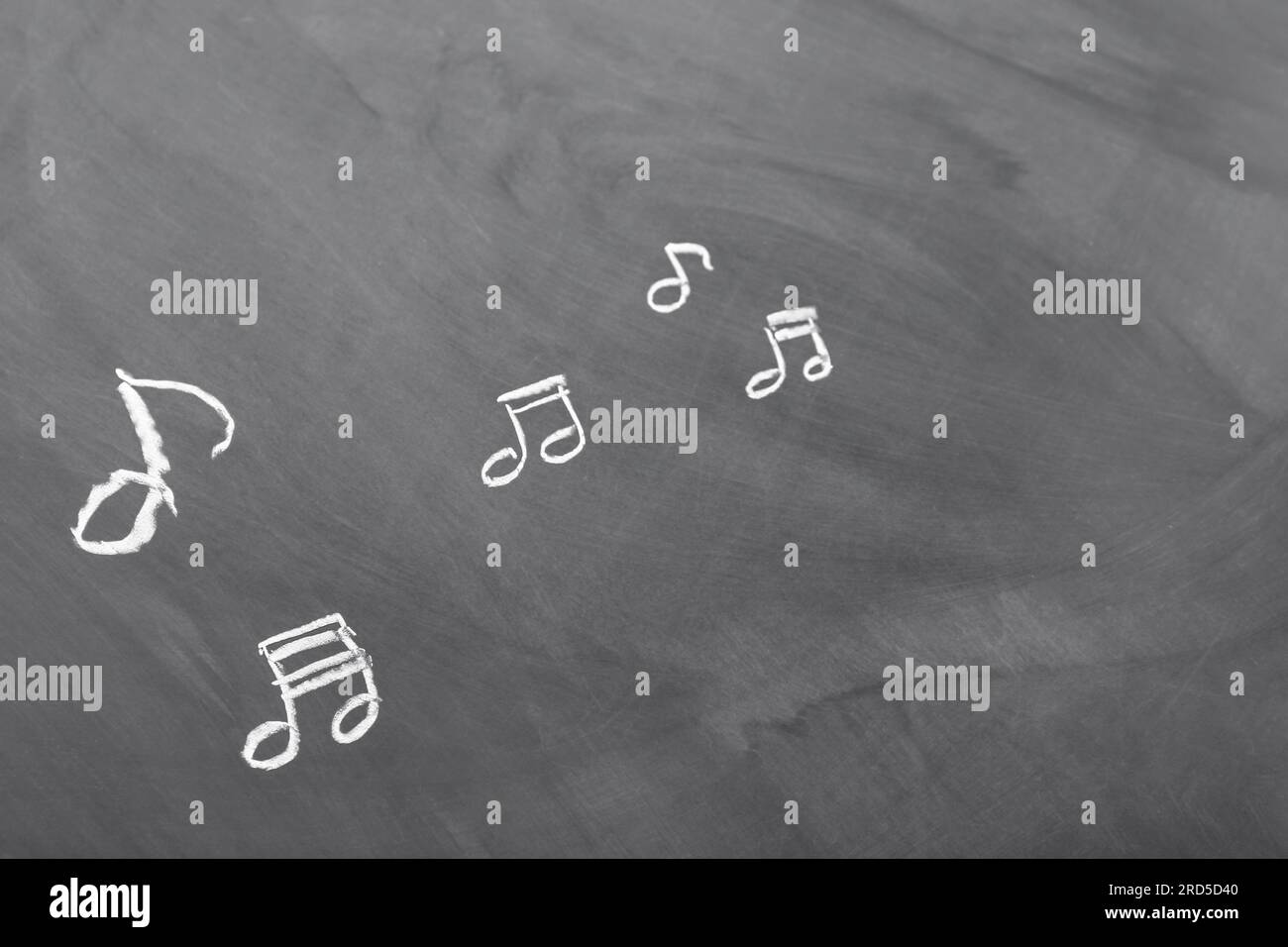 Different music notes on black background Stock Photo - Alamy