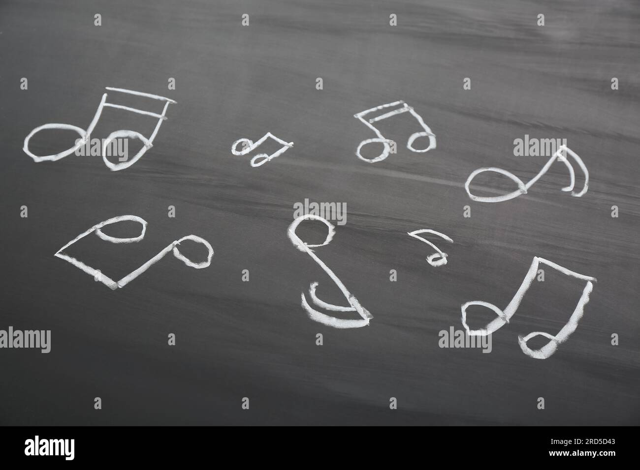 Different music notes on black background Stock Photo - Alamy