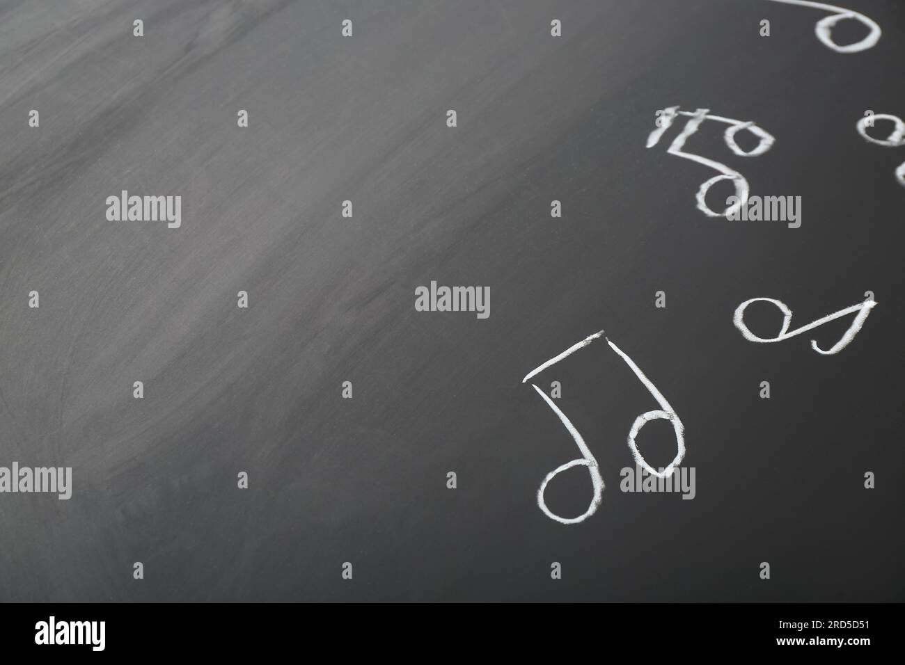 Different music notes on black background Stock Photo - Alamy