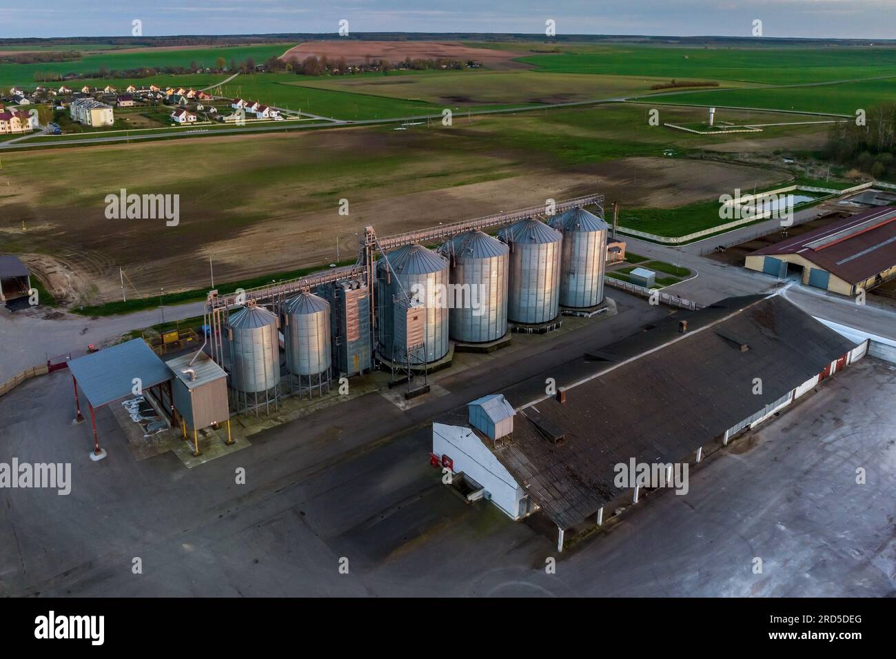 aerial panoramic view on agro-industrial complex with silos and grain ...