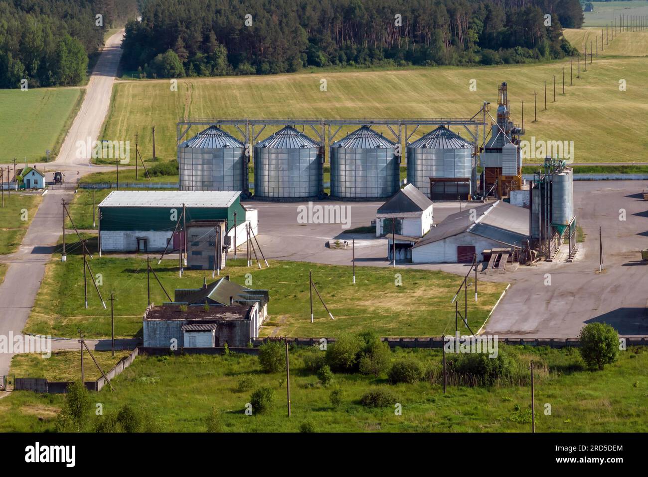 aerial panoramic view on agro-industrial complex with silos and grain ...