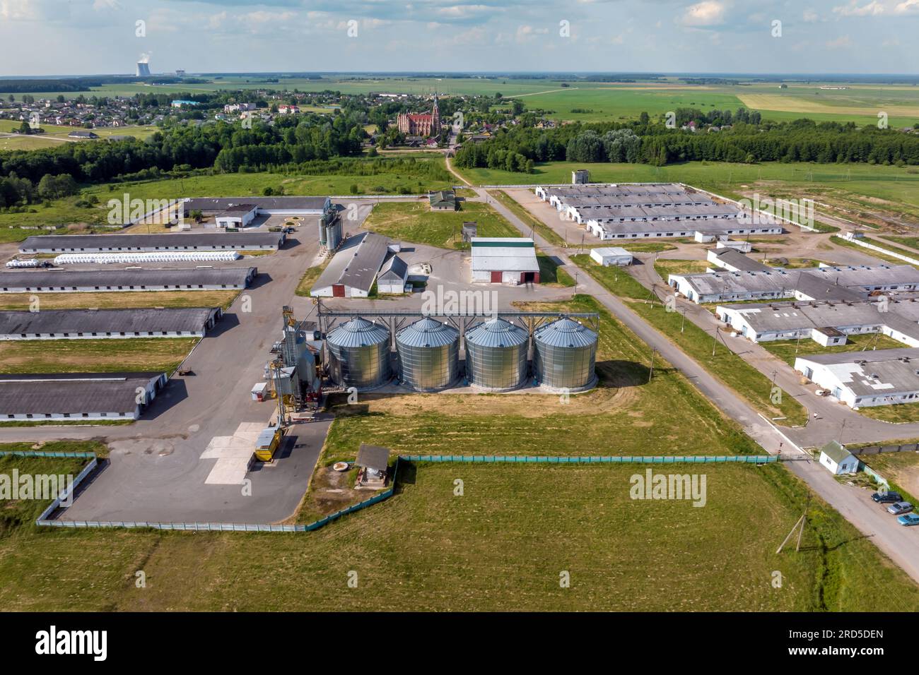 aerial panoramic view on agro-industrial complex with silos and grain ...