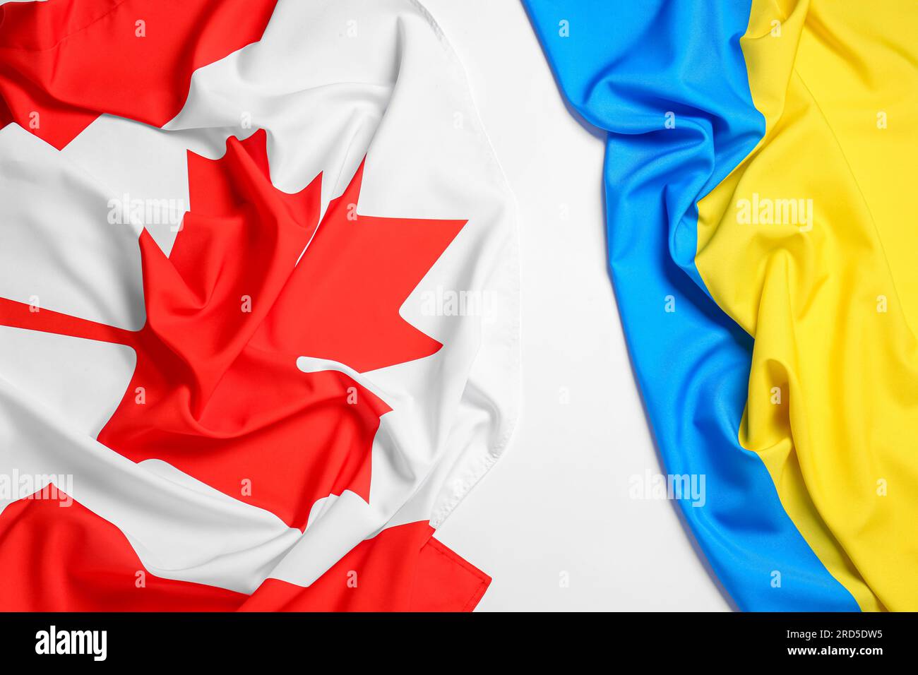 Flags of Canada and Ukraine on white background Stock Photo - Alamy