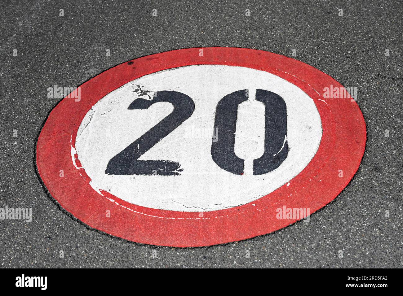 Ground marking speed limit 20 Stock Photo - Alamy
