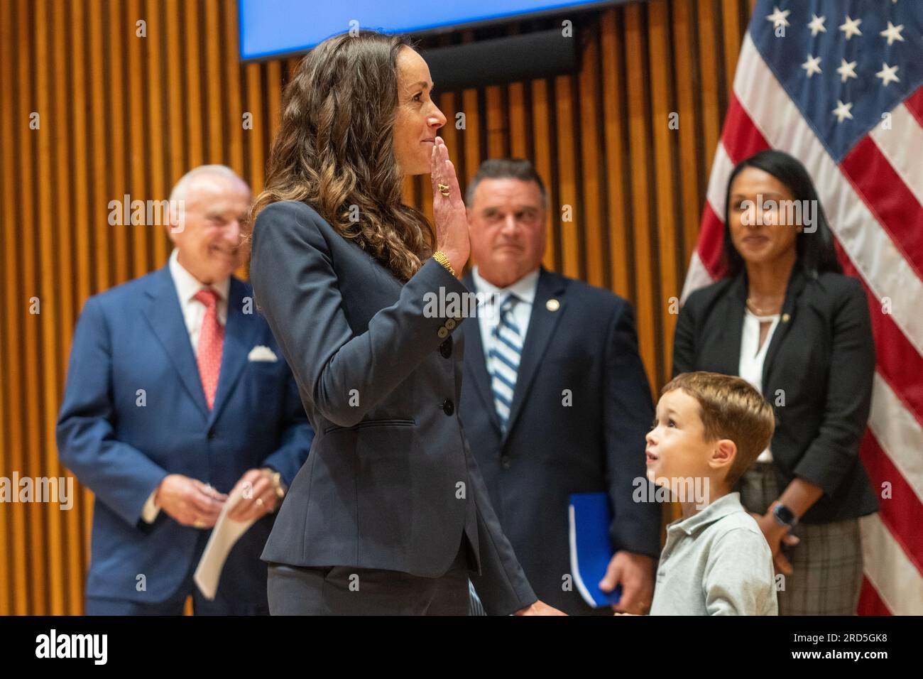 Rebecca Weiner takes an oath at public safety announcement by Mayor ...