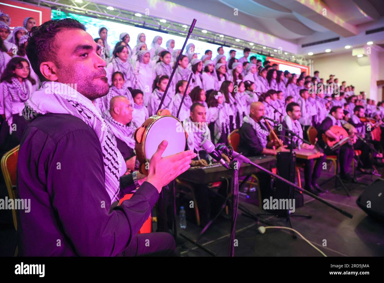 A Palestinian musician takes part in a closing ceremony for the ...