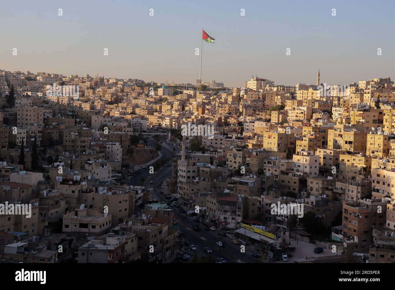 Jordan : The Arab Muslim town of Amman and the Jordanian flag mast ...