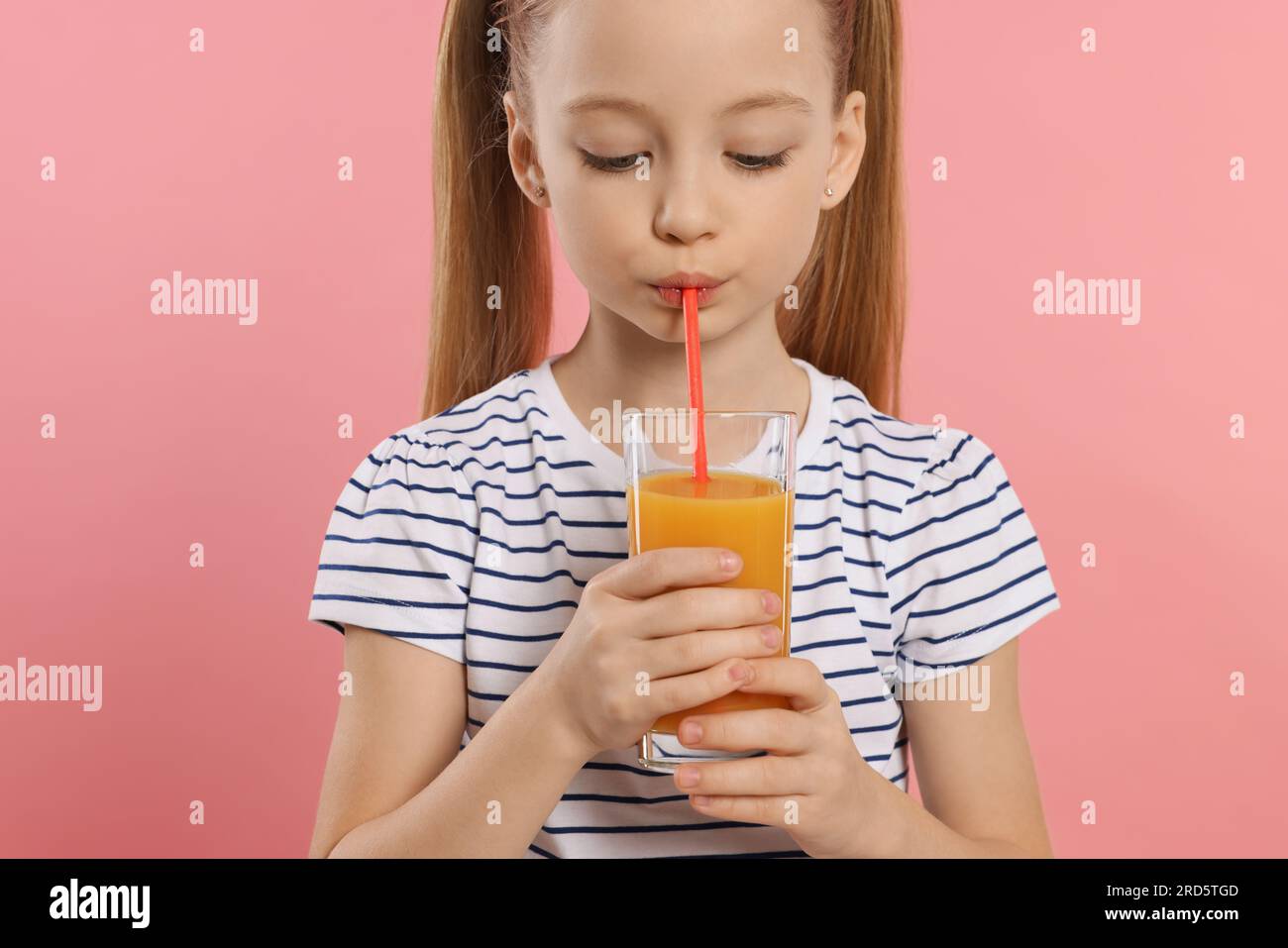 School girl juice straw hi-res stock photography and images - Alamy