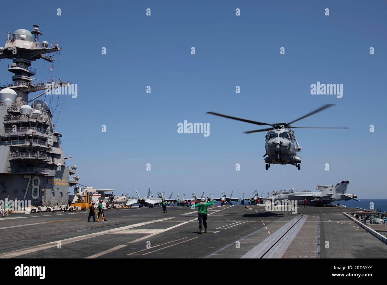 A French Navy NH90 NATO frigate helicopter approaches the flight deck ...