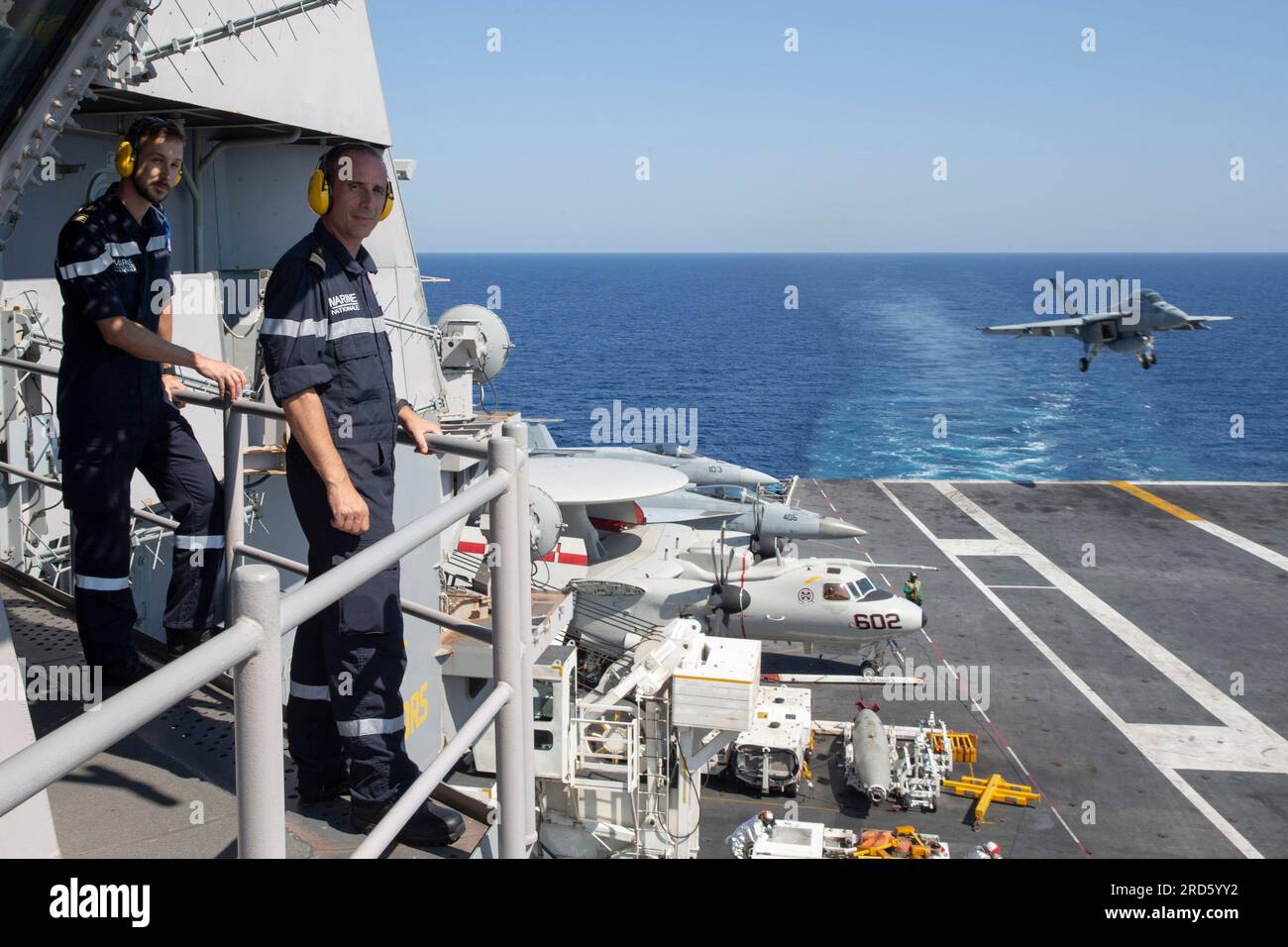 Capt. Laurent Saunois, right, commanding officer, French Navy frigate ...