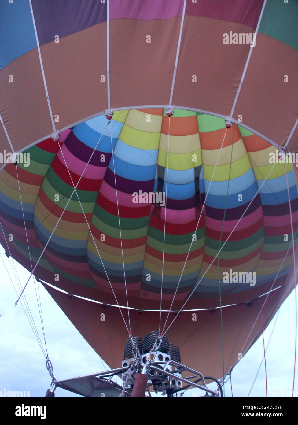 Process of inflation and preparation of hot air balloon at sunrise for ...